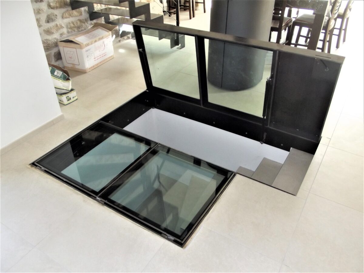 Trappe sur vérin verre - Métal Design